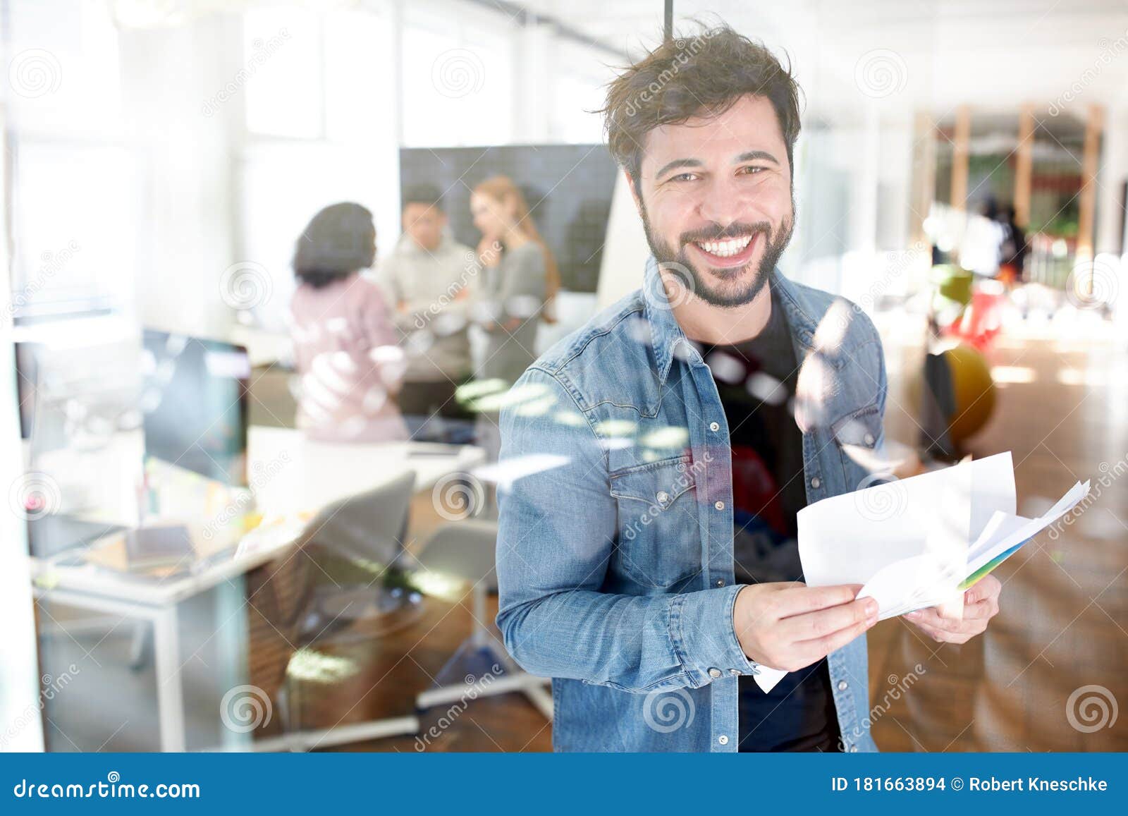 Successful Start-up Founder with Papers Stock Photo - Image of papers ...