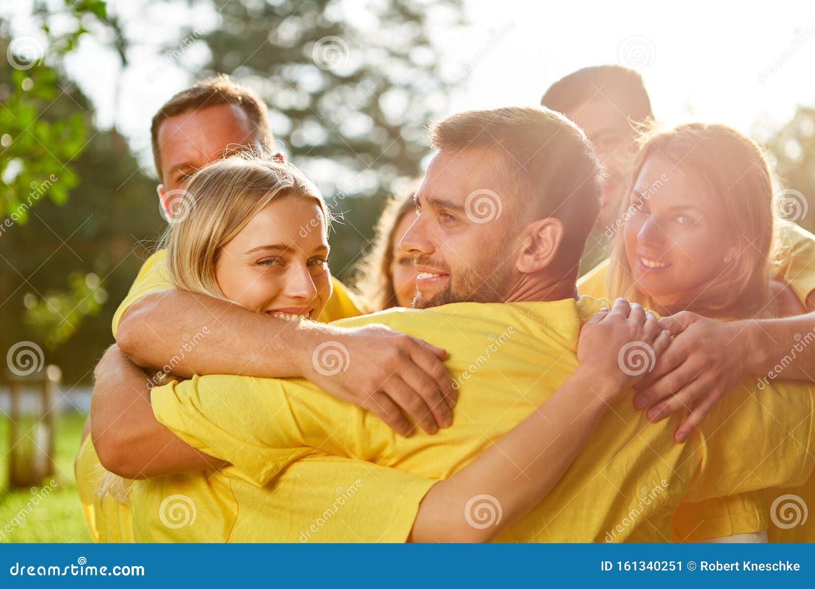 Successful Team Embraces Each Other Happily Stock Image - Image of ...