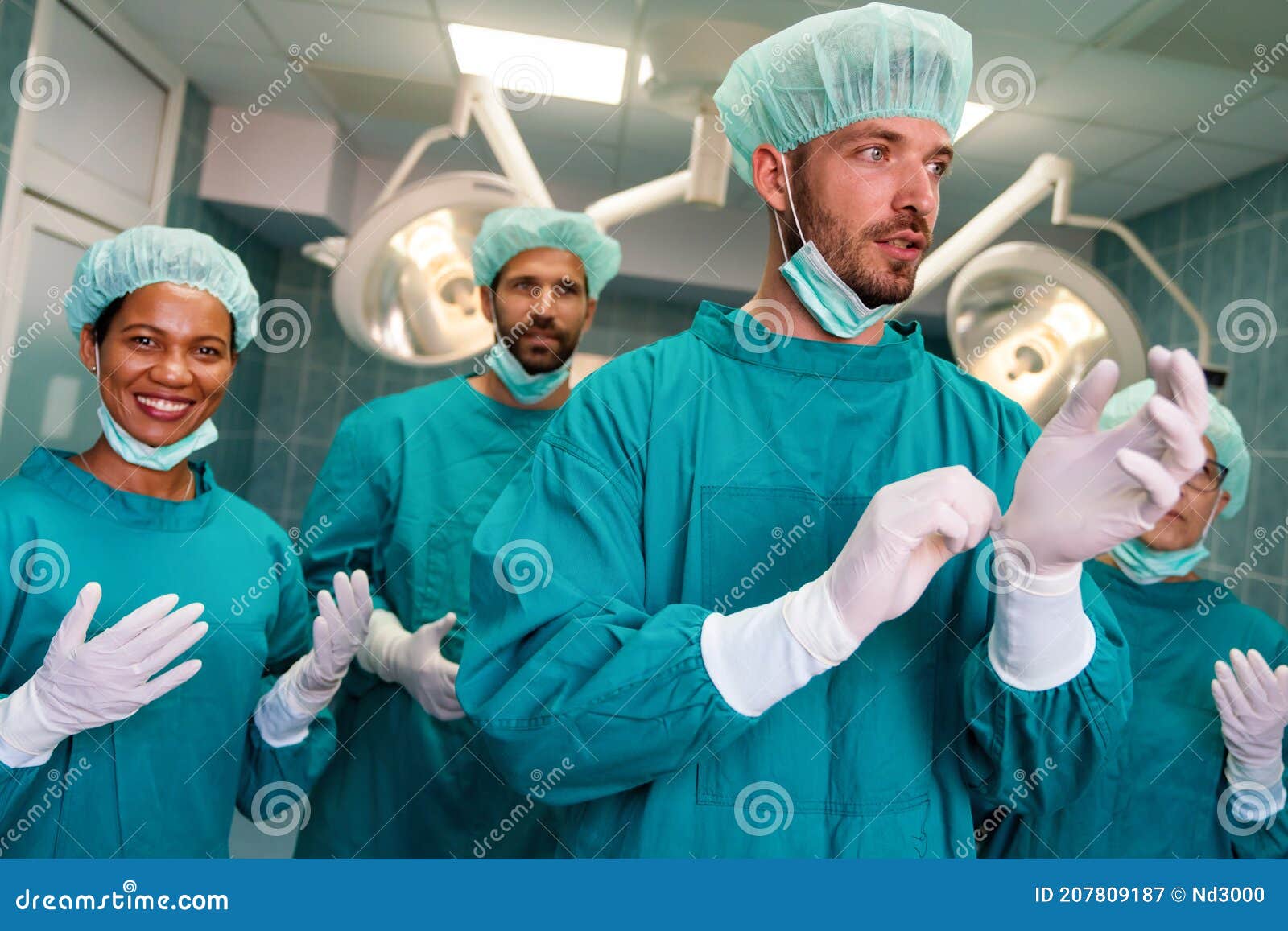 Successful Team of Surgeon Standing in Operating Room, Ready To Work on ...