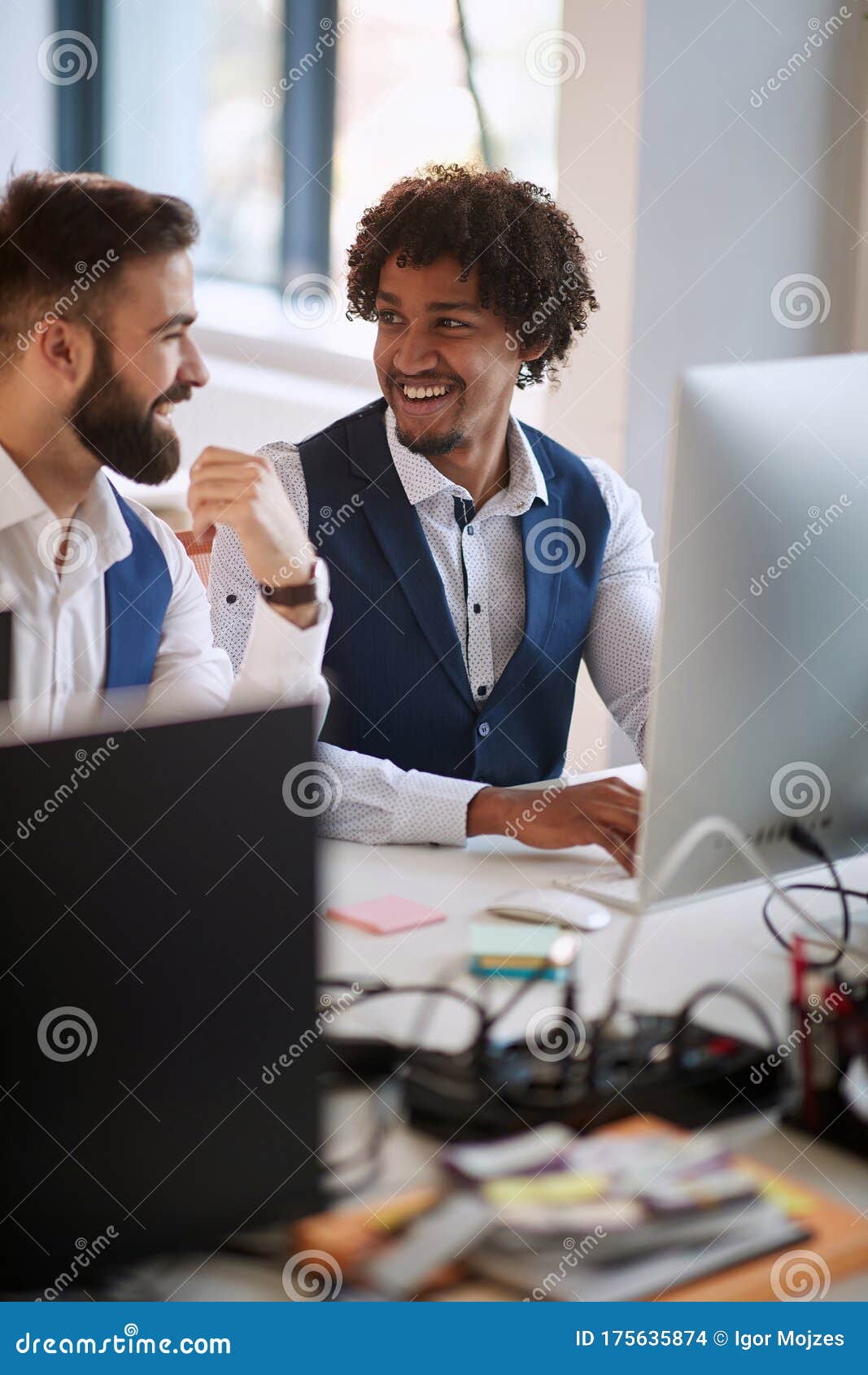 Successful Two Young Businessmen Working on Computer.Modern High Tech ...