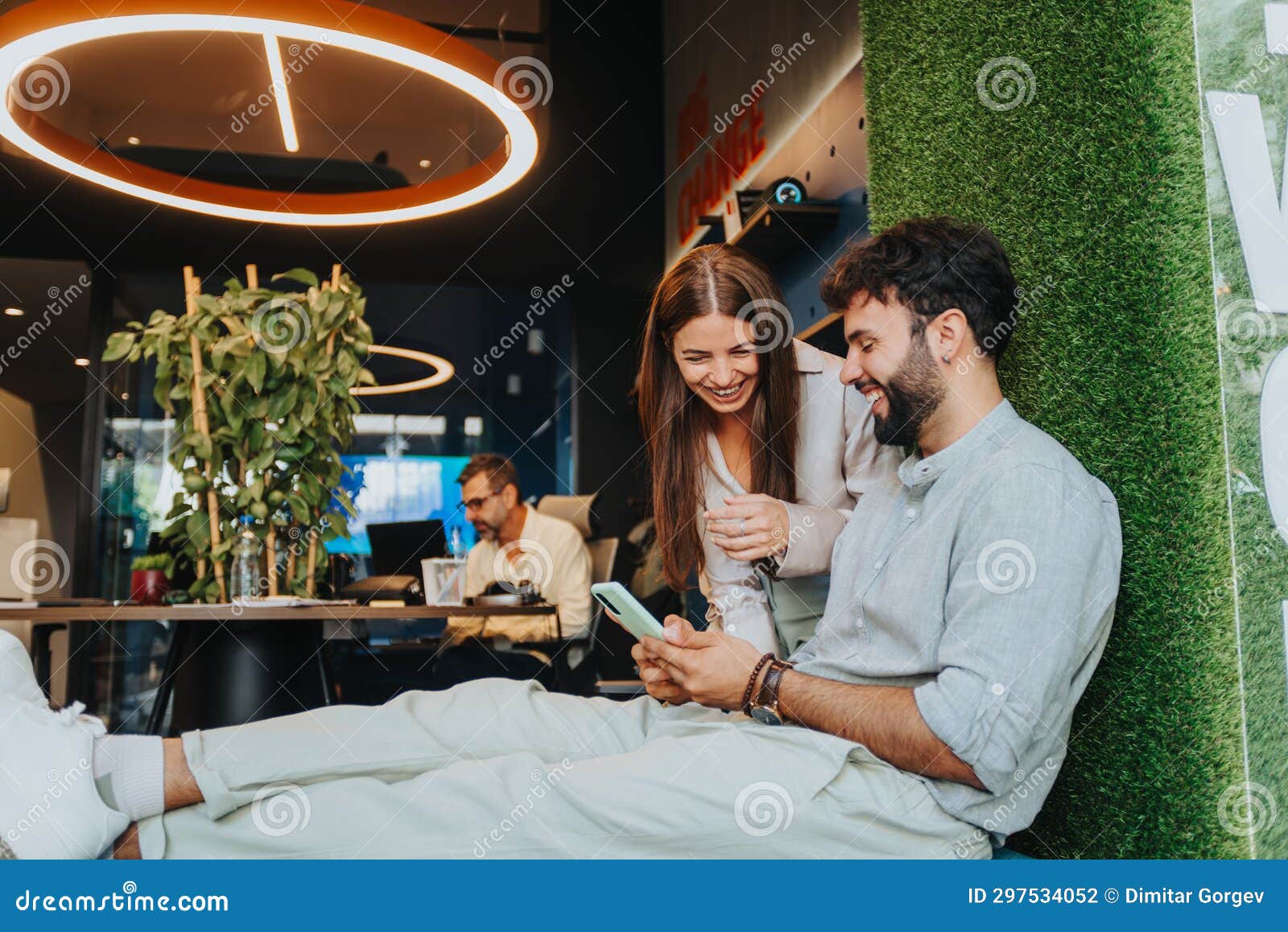 Diverse Professionals Collaborating in a Creative Co-working Space. Successful Team Driving ...