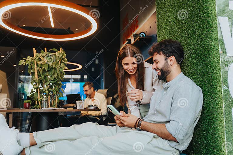 Diverse Professionals Collaborating in a Creative Co-working Space ...