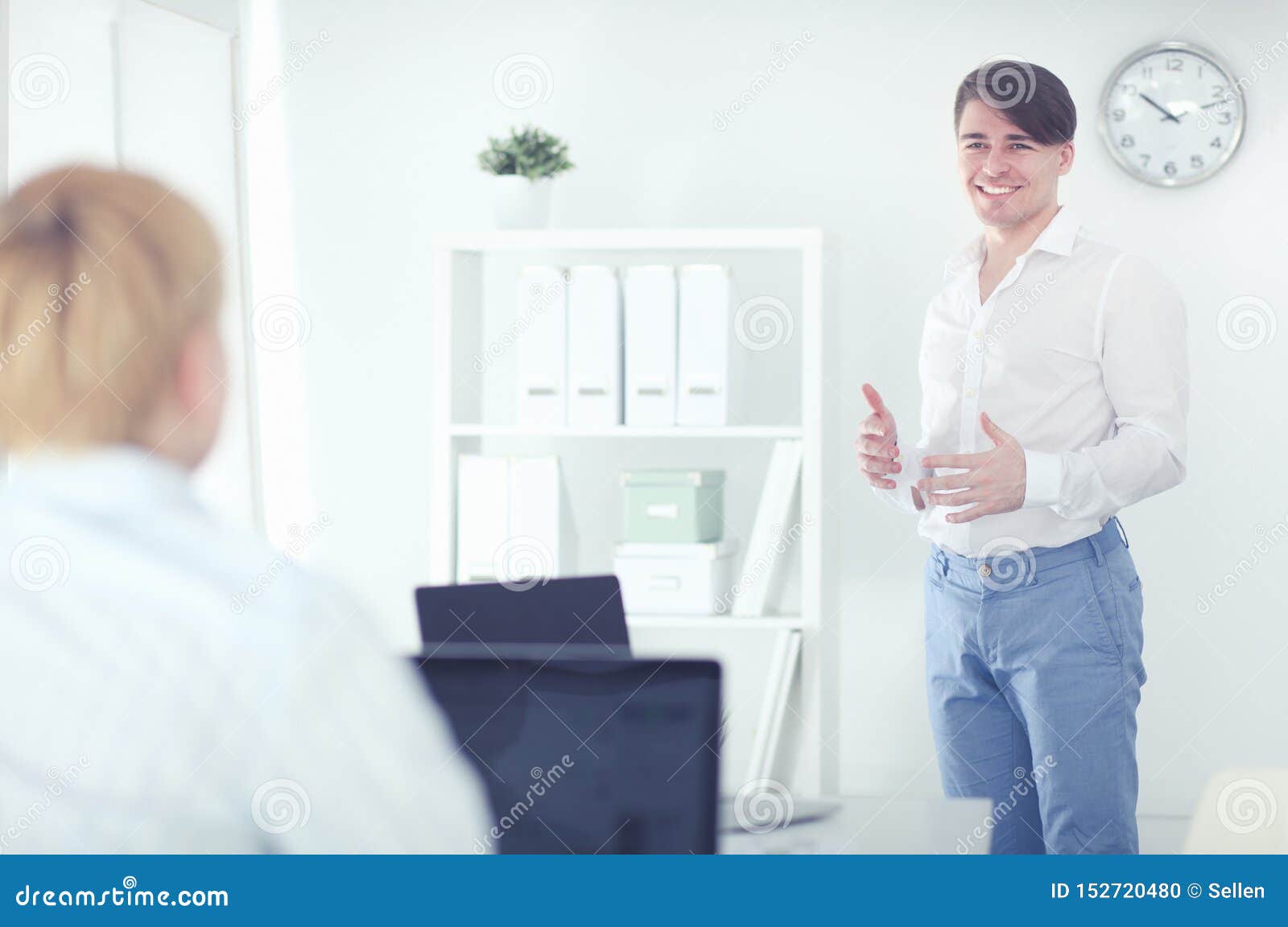 Successful Young Businessman Standing in His Office Stock Photo - Image ... Successful Young Businessman Standing in His Office Stock Photo - Image ...