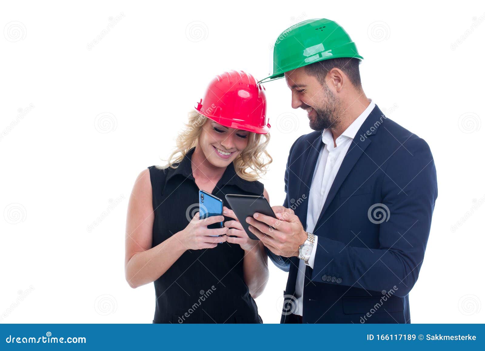 Successful Young Engineers with Mobile Communication Devices Isolated ...