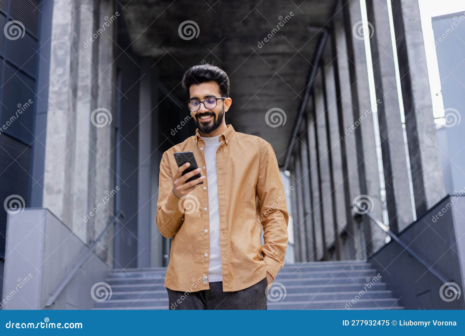 Successful Young Hindu Man Walking Outside Office Building, Engineer ...