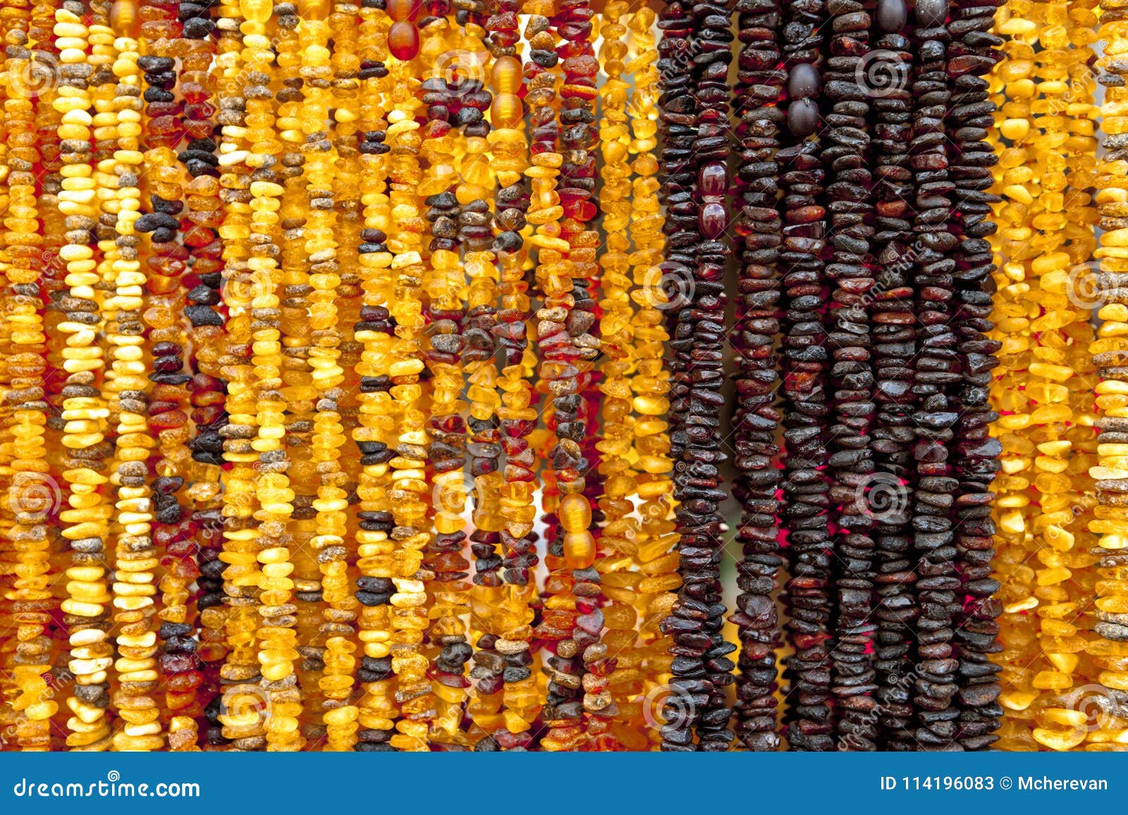 Succinite. Amber Necklace. Amber of Different Colors and Sizes. Stock ...