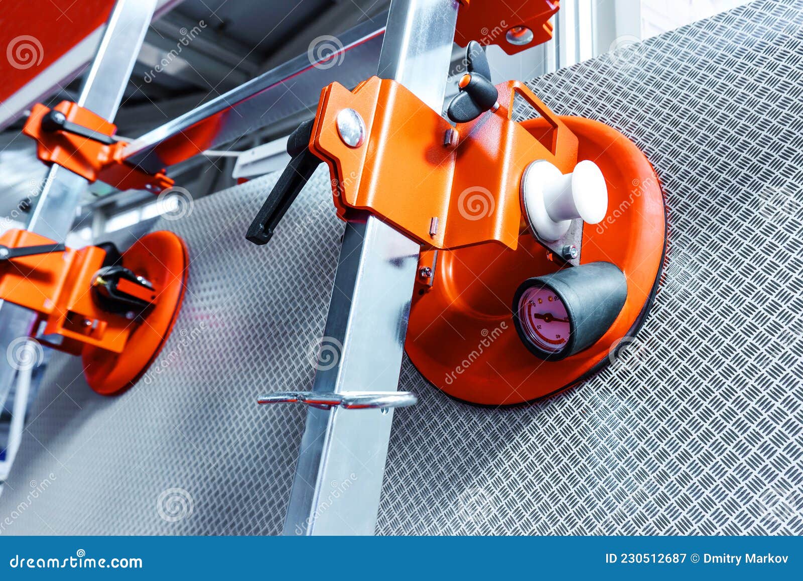 Suction Cups for Transporting Large Sheets of Metal. Equipment for the ...