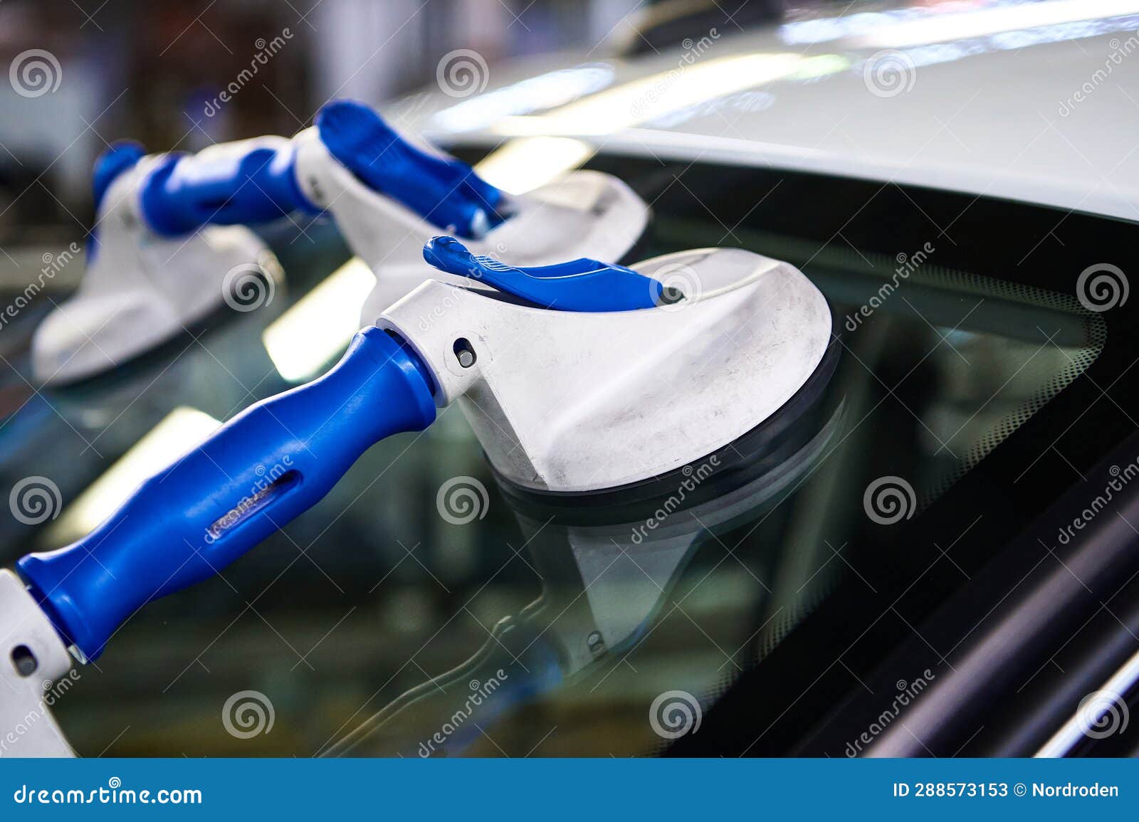 Suction Pads for Car Windshield Installing in Workshop Stock Image ...