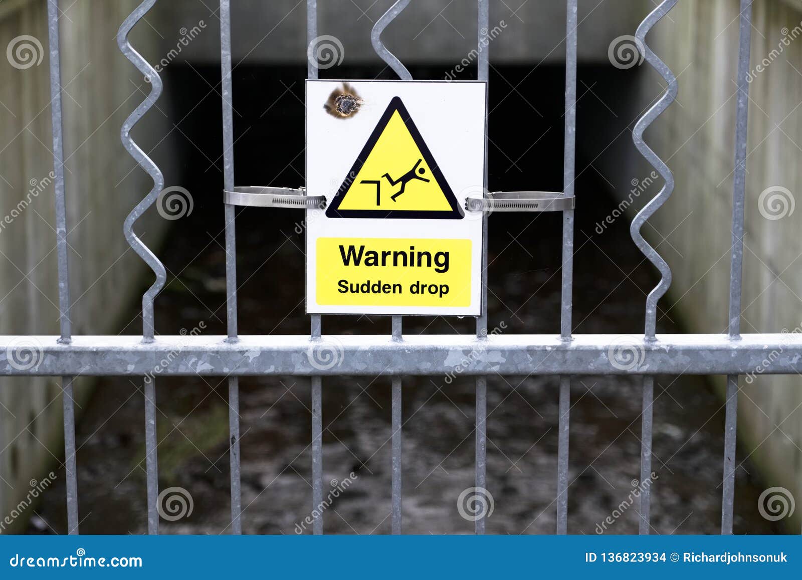 Sudden drop warning sign stock photo. Image of rural - 136823934