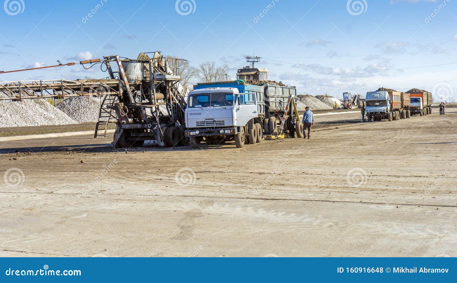 A Sugar Beet Harvest in Progress - Tractor and Trailer Unload Sugar ...