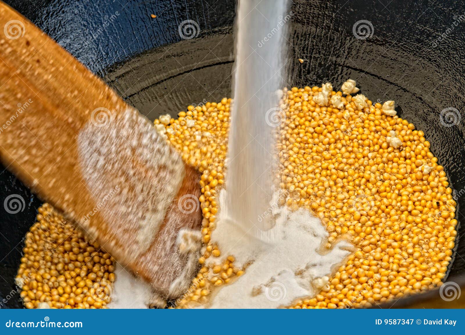 Sugar Being Added To Kettle Corn Stock Image - Image of unpopped ...