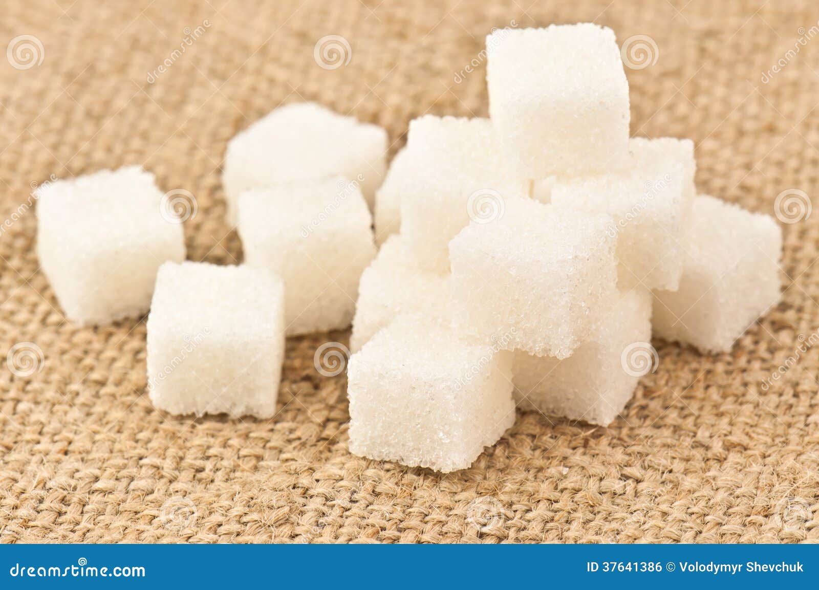 Sugar blocks on burlap stock photo. Image of arenaceous - 37641386
