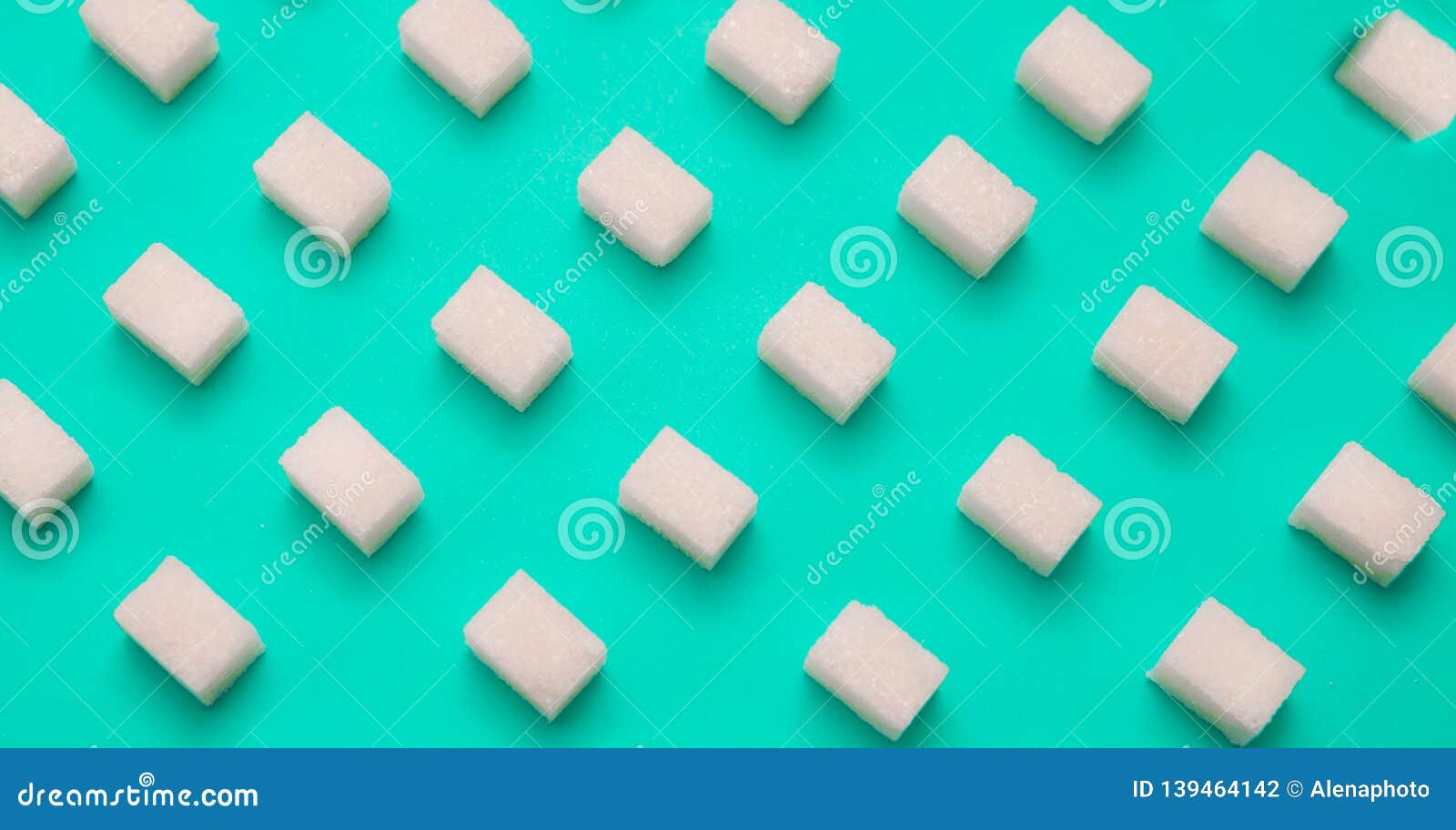 Sugar on blue background. stock photo. Image of modern - 139464142