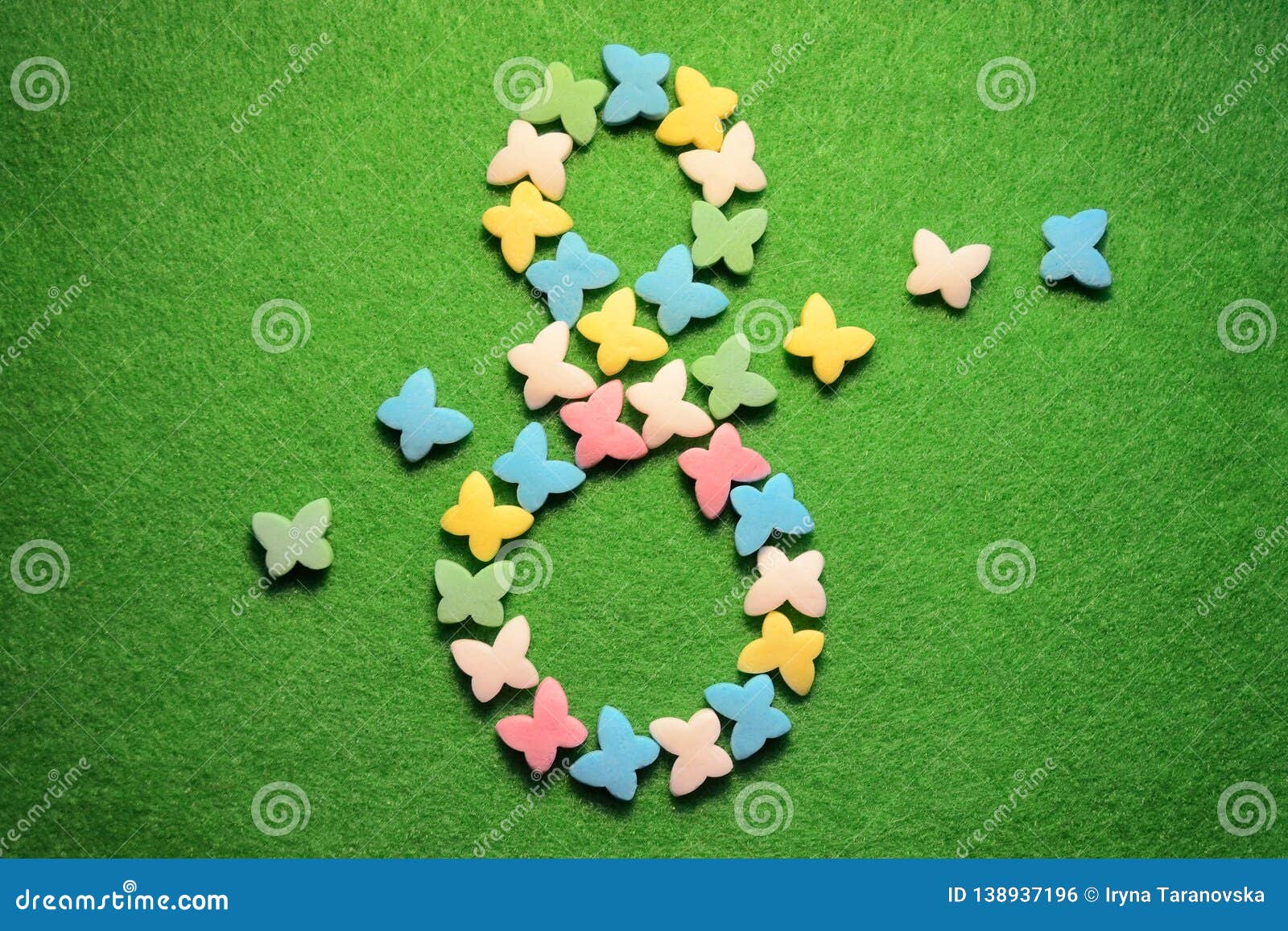Sugar Colored Butterflies on a Green Rough Surface, in Shape of Number ...