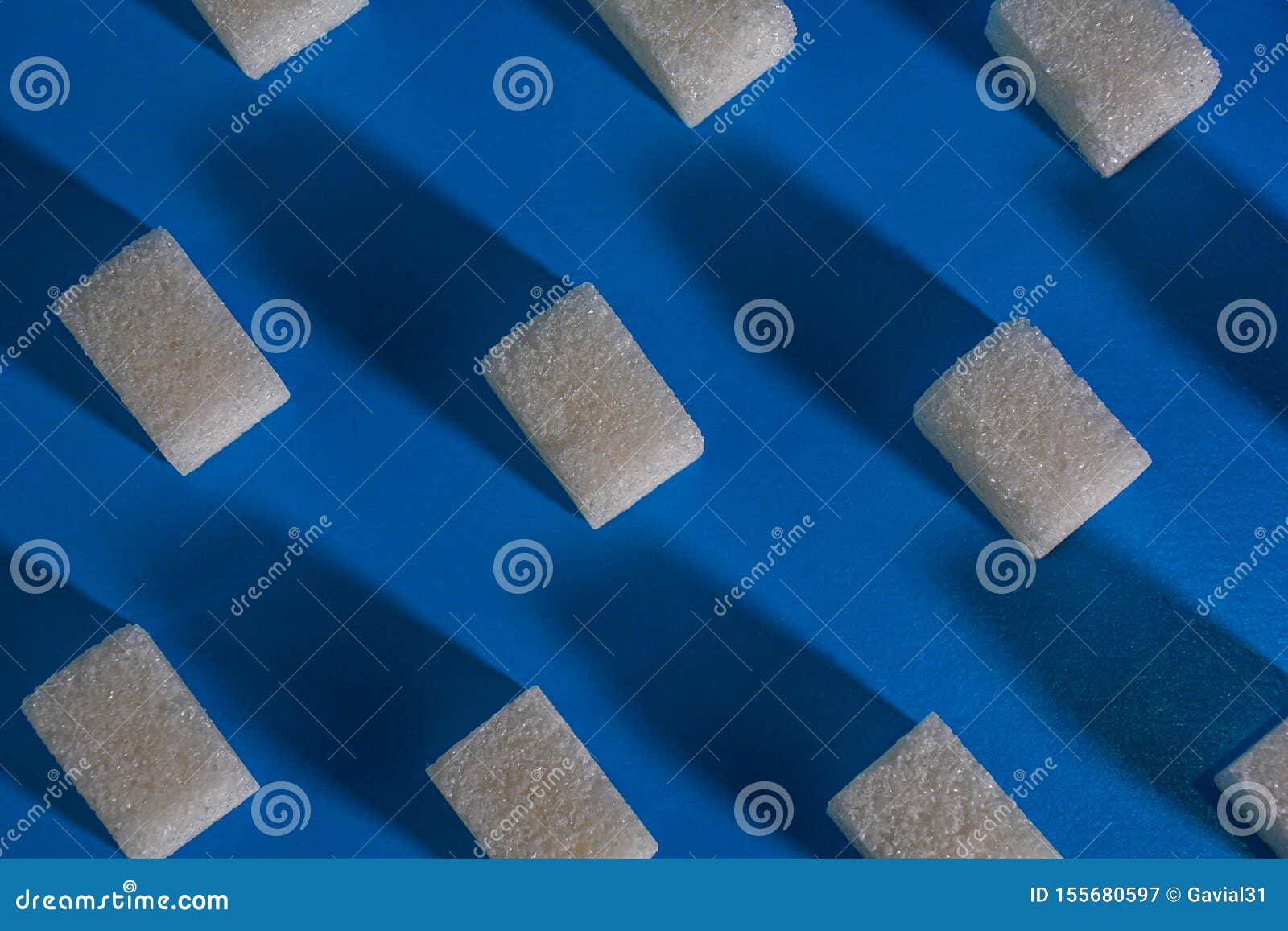 Sugar Cubes on a Blue Background. Abstract Background Stock Image ...