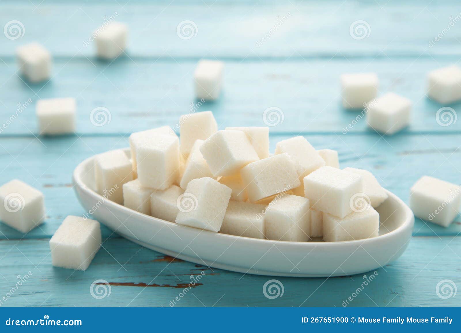 Sugar Cubes in a Bowl on Blue Background Stock Photo - Image of meal ...