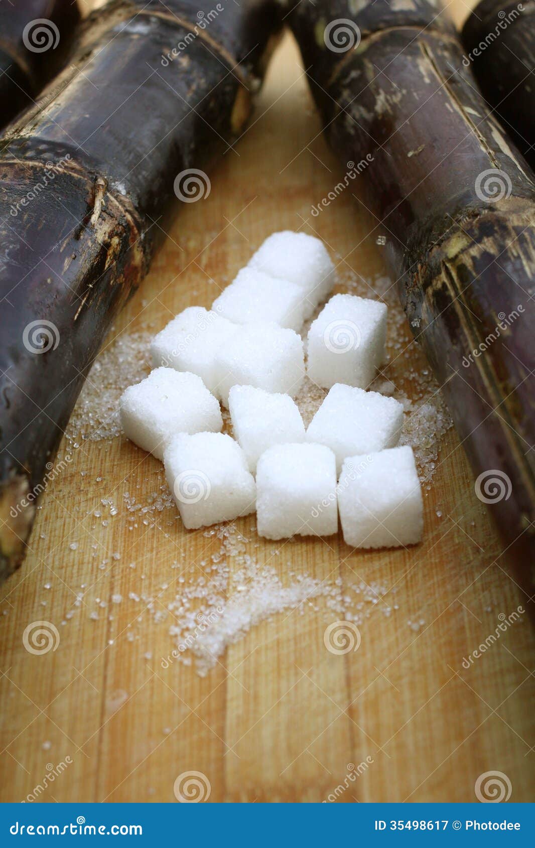 Sugar Cubes and Red Sugar Cane Stock Image - Image of lump, lots: 35498617
