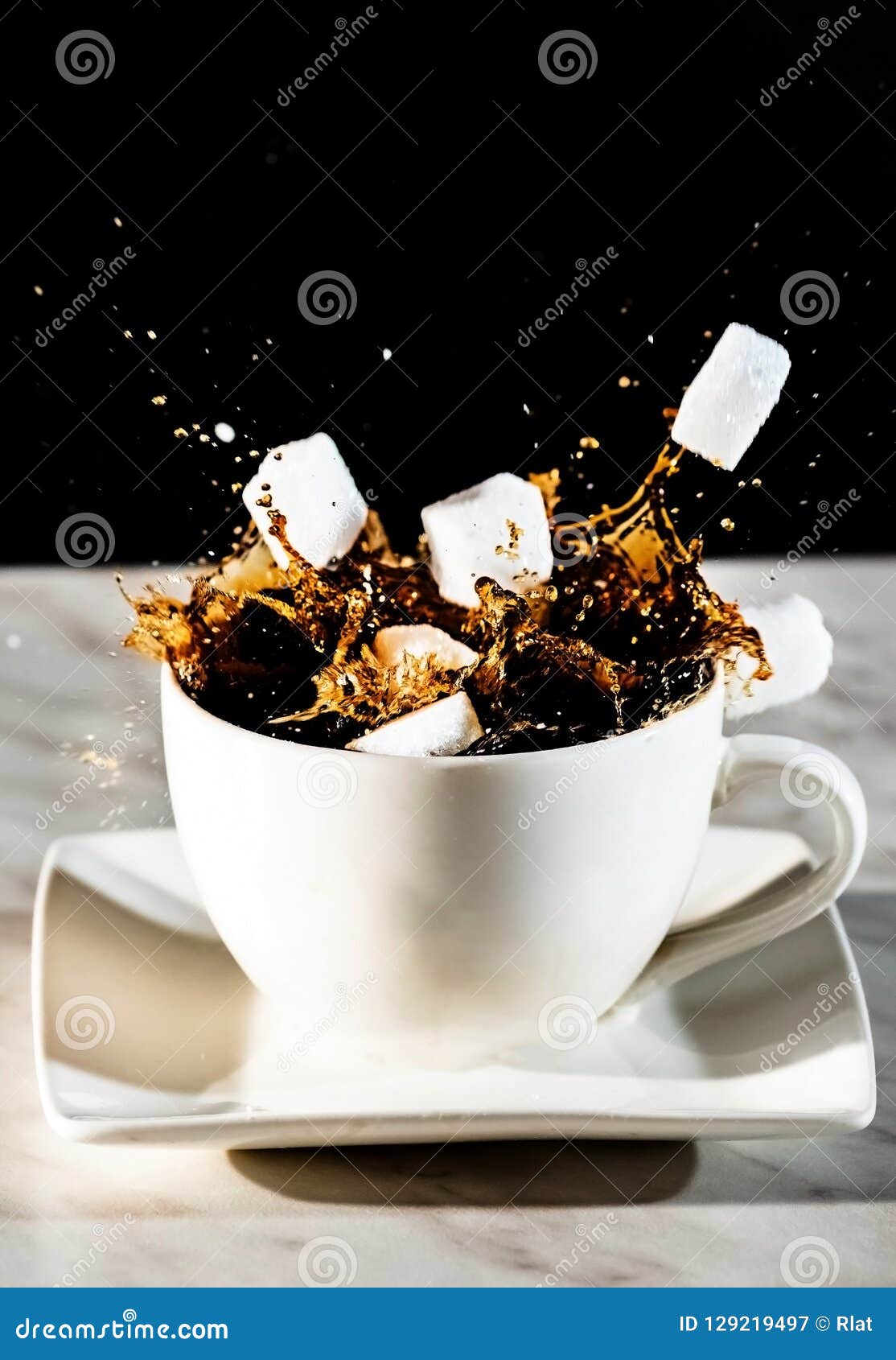 Sugar Cubes Thrown into a Cup of Coffee Stock Image - Image of ...