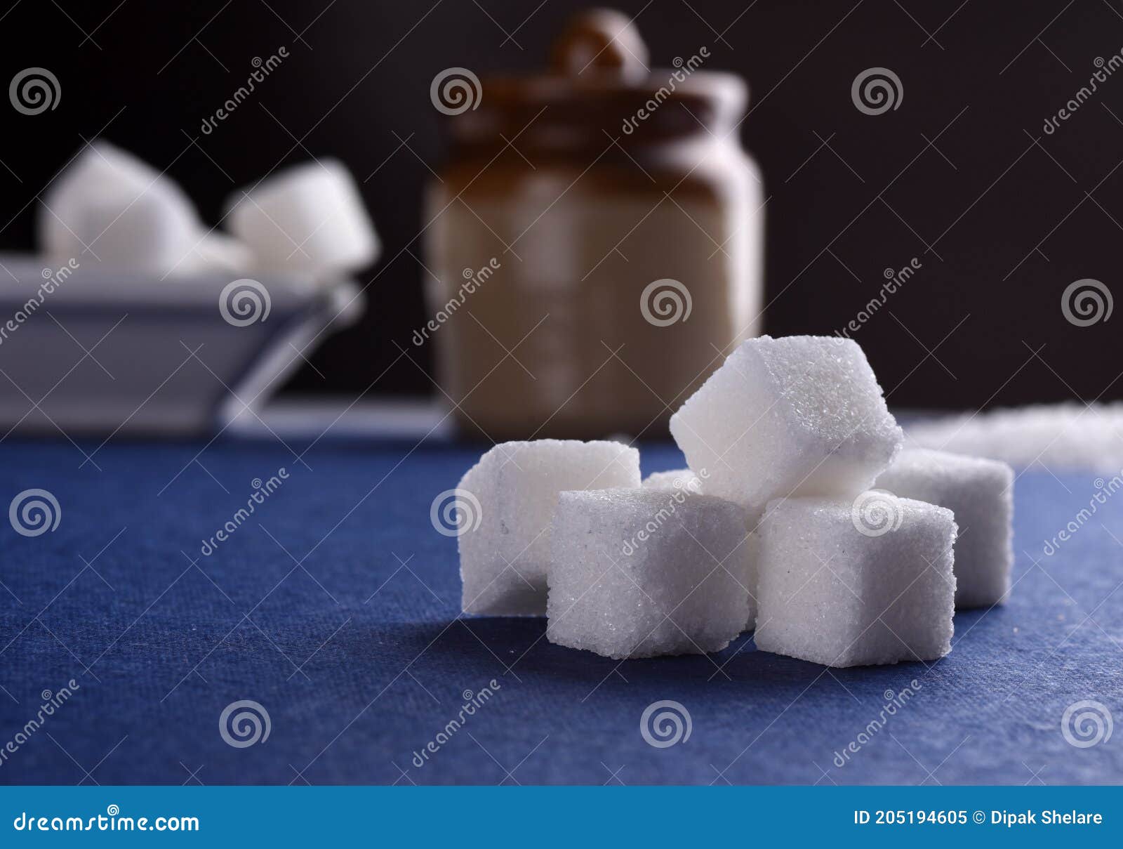 Close-up of Sugar Cubes on Blue Background Stock Image - Image of grain ...