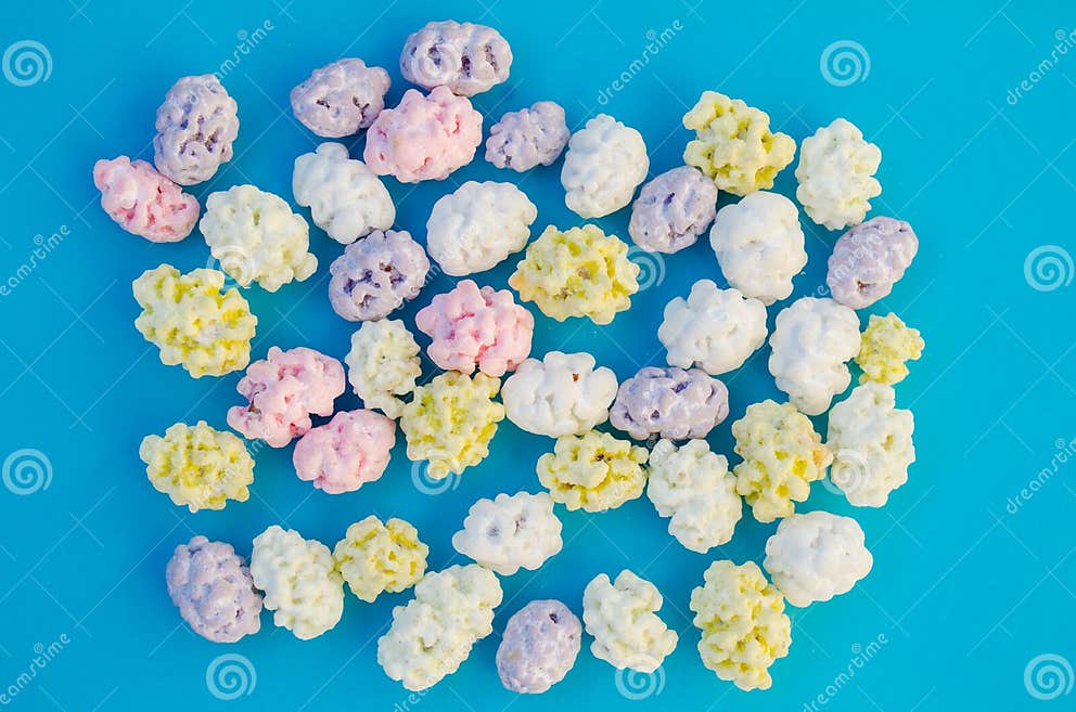 Sugar Dragees with Peanuts Inside, in the Form of Clouds, Lie on Blue ...