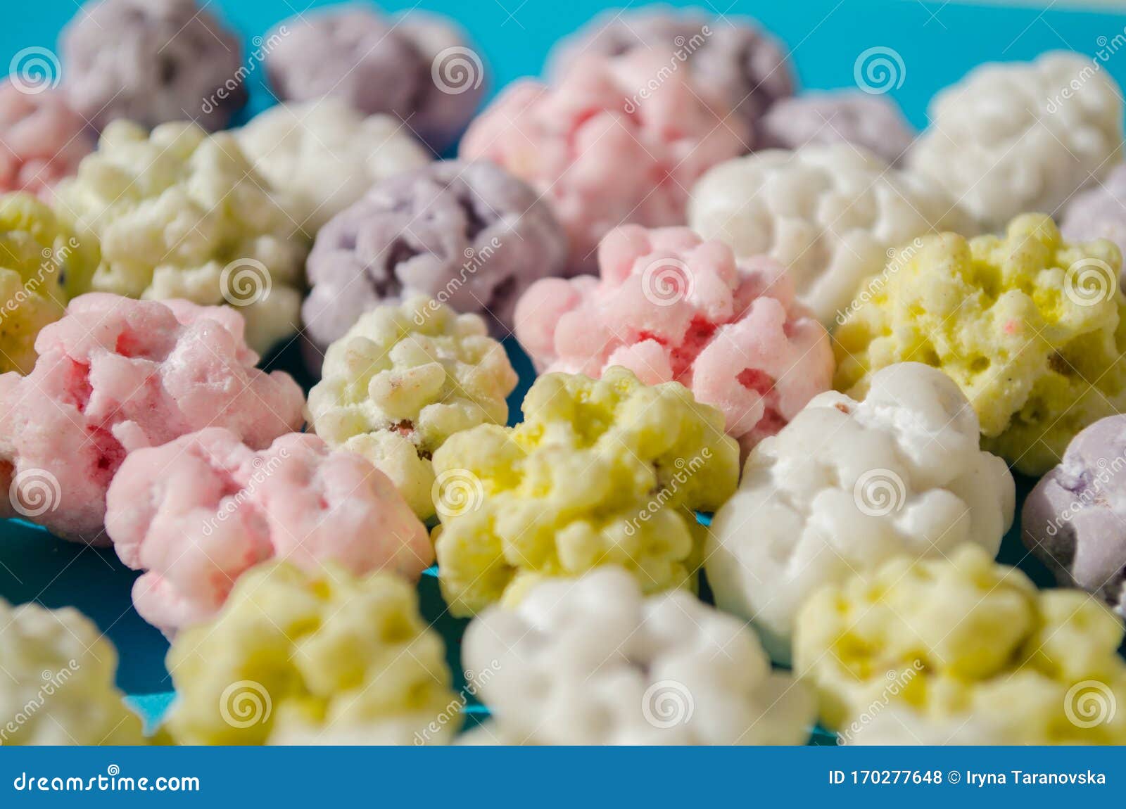 Sugar Dragees with Peanuts Inside, in the Form of Clouds, Lie on Blue ...