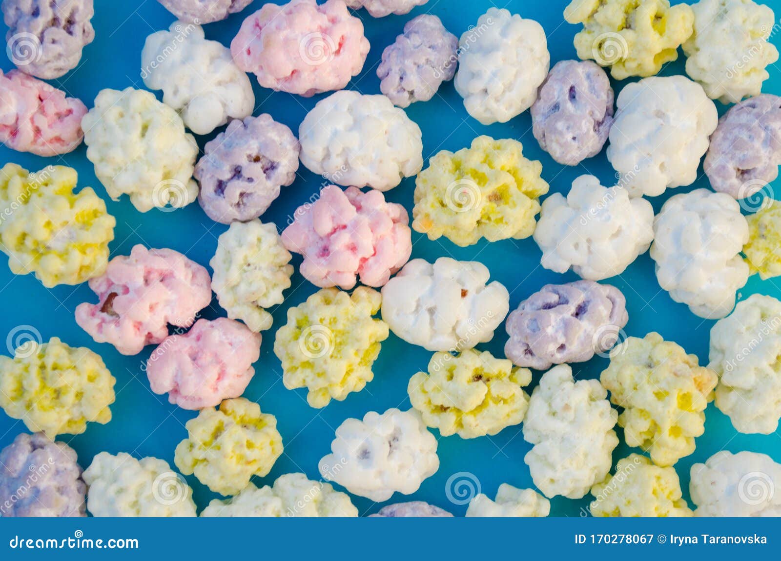 Sugar Dragees with Peanuts Inside, in the Form of Clouds, Lie on Blue ...