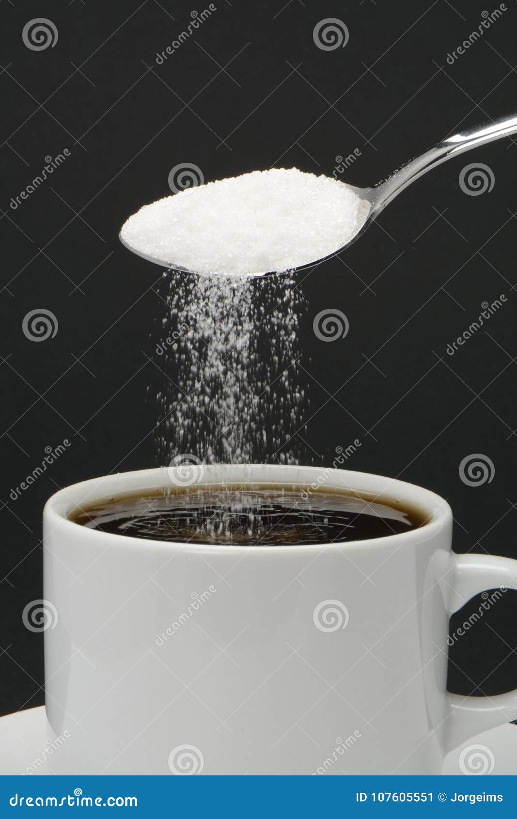 Sugar falling from a spoon stock image. Image of sweet - 107605551
