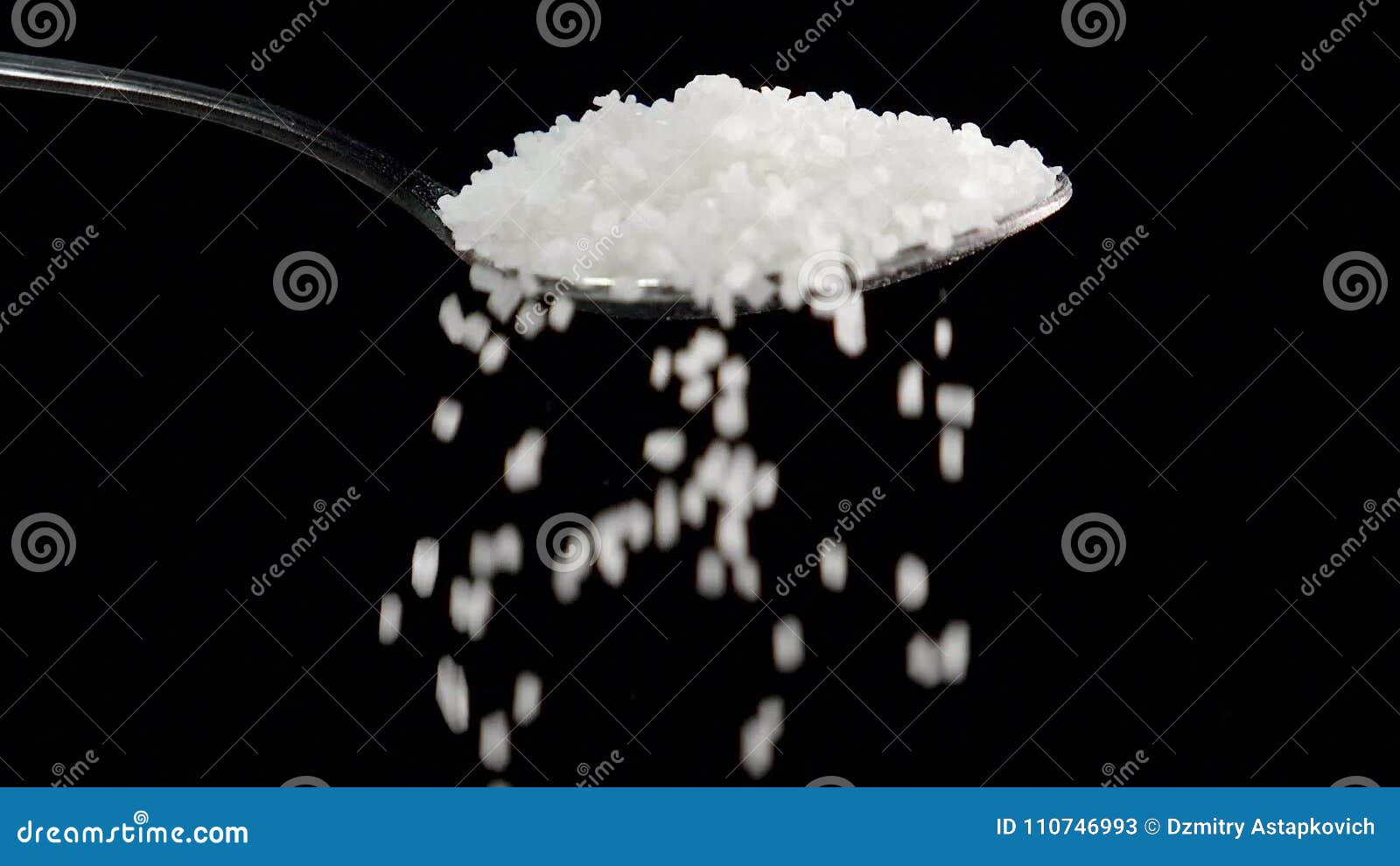 Sugar Falling from the Spoon in Dark Studio. Slowmotion, 180 Fps Shot ...