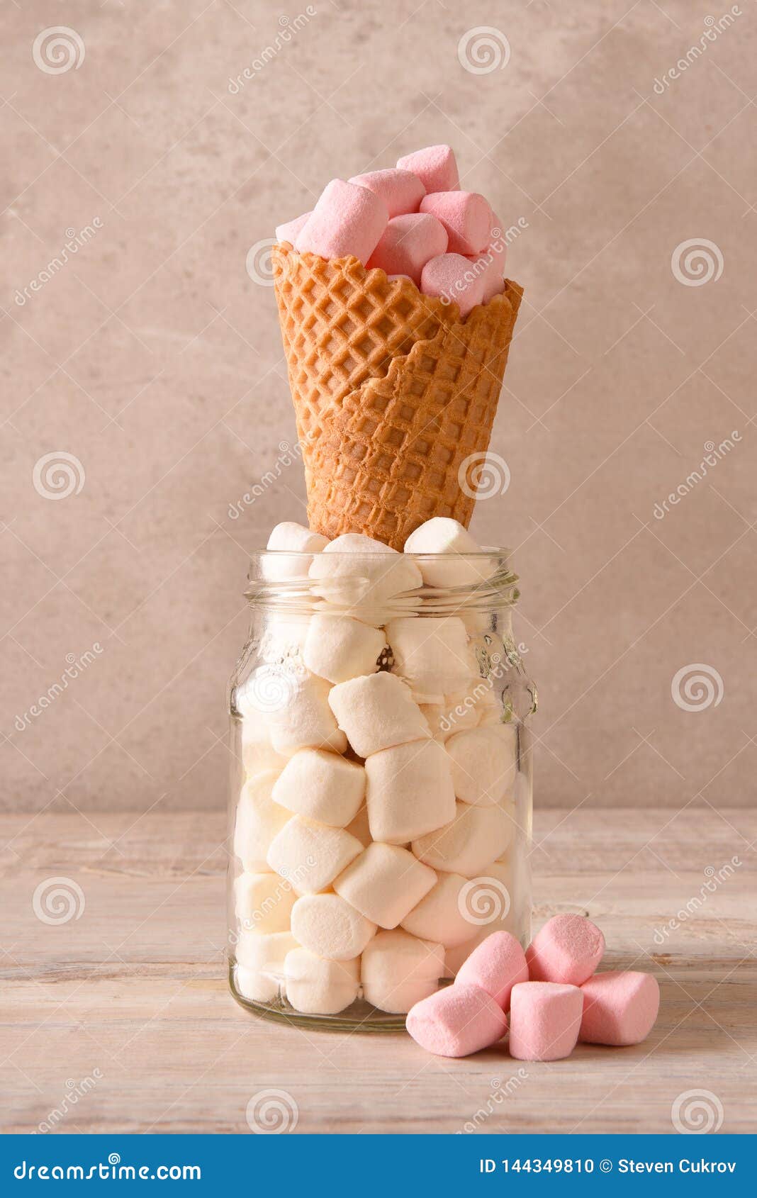 A Sugar Ice Cream Cone in a Jar of Mini Marshmallows and Filled with ...
