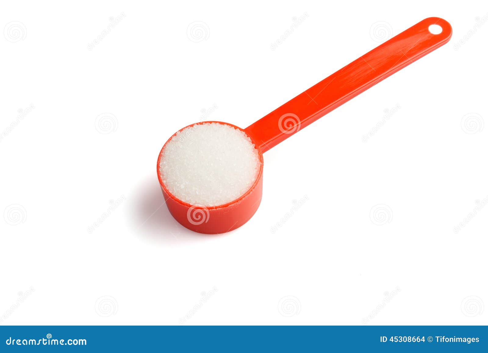 Sugar on a measuring spoon stock photo. Image of spoon - 45308664