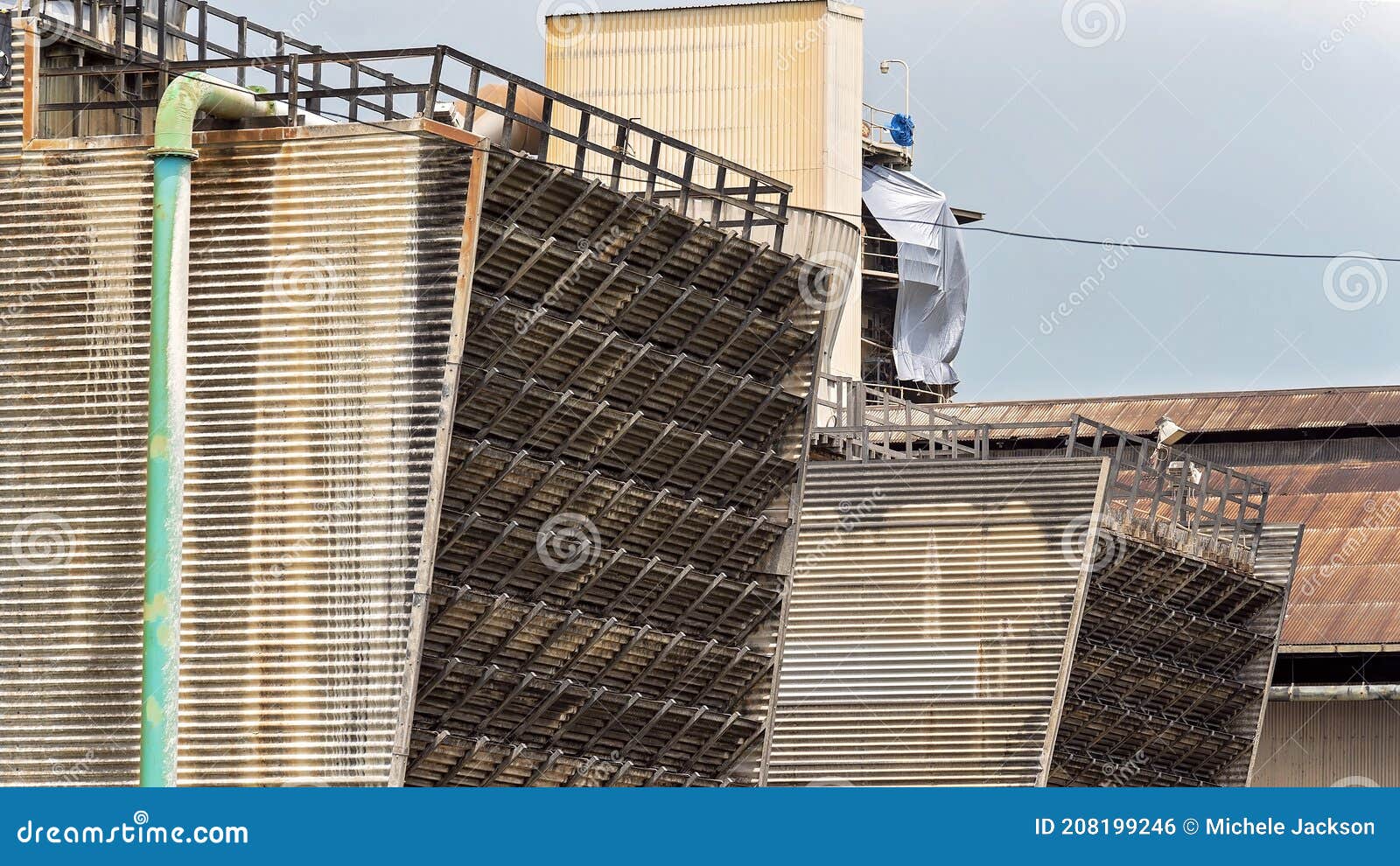 Sugar Mill Cooling Tower stock photo. Image of environmental - 208199246