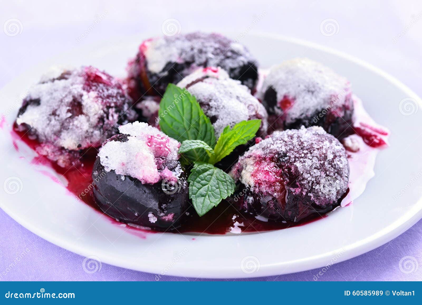 Sugar plums on white plate stock image. Image of diet - 60585989