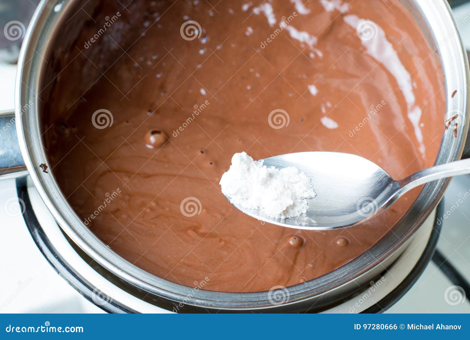 Sugar Powder into Melted Chocolate Stock Photo - Image of flow, liquid ...