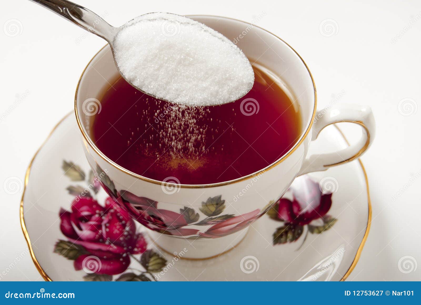 Sugar Spilling into Teacup stock image. Image of drink - 12753627