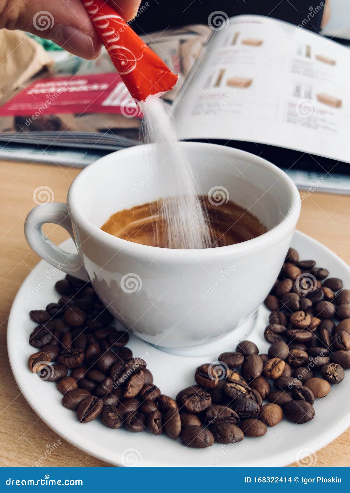 Sugar stick pour in coffee stock photo. Image of packet - 168322414