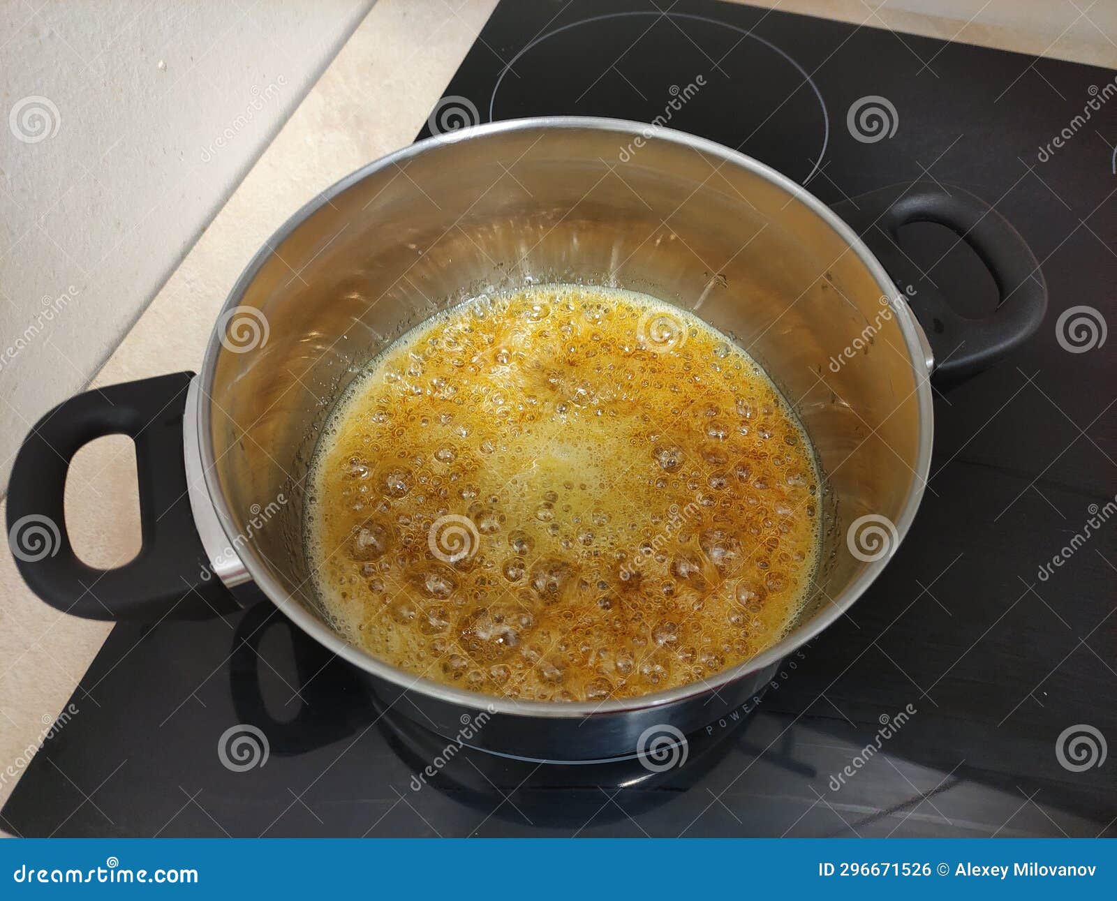 Sugar Syrup Boils in a Saucepan. Preparation of Paste for Sugaring ...