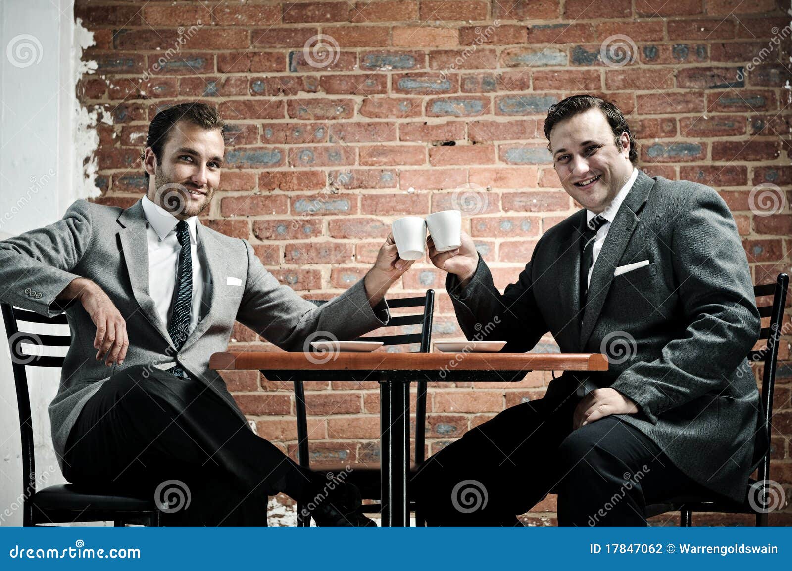 Suit Wearing Men Make a Deal Stock Photo - Image of male, cafe: 17847062