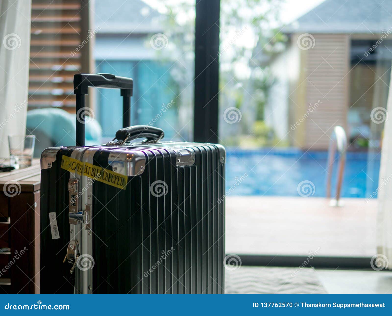 Suitcase in Hotel Room. Ready for Check in or Check Out Stock Photo ...