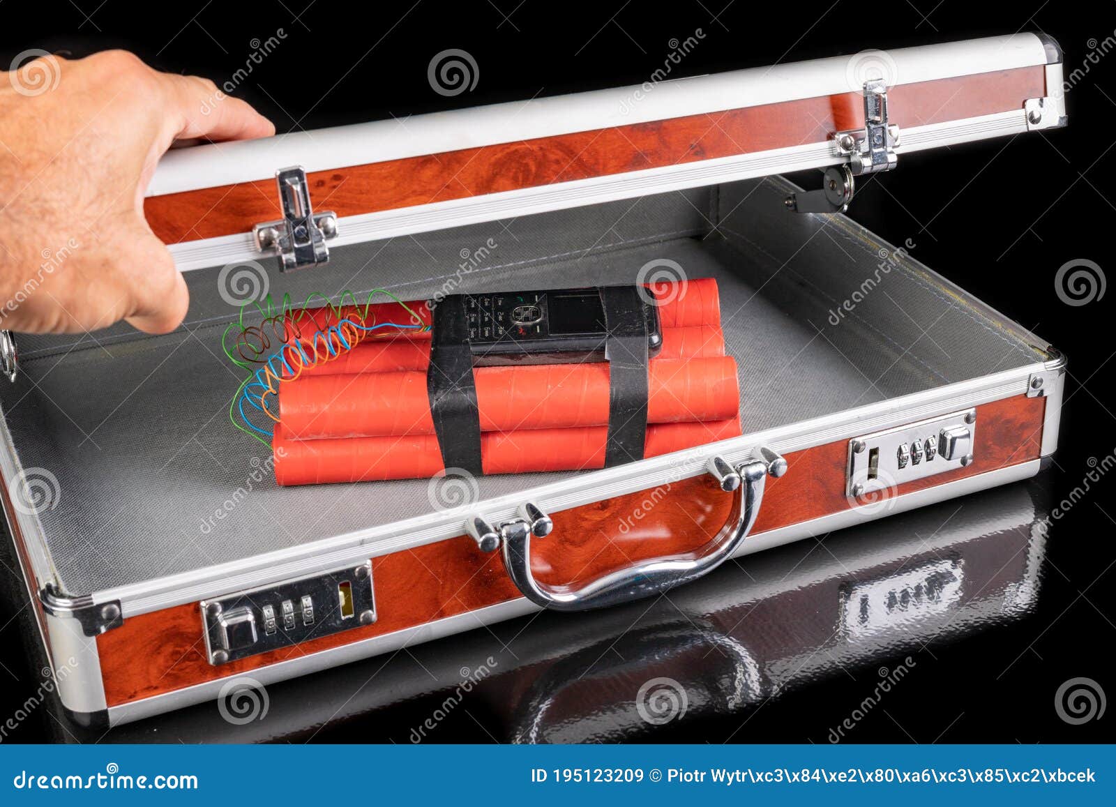 The Suitcase is Locked with a Combination with an Explosive Charge. a ...