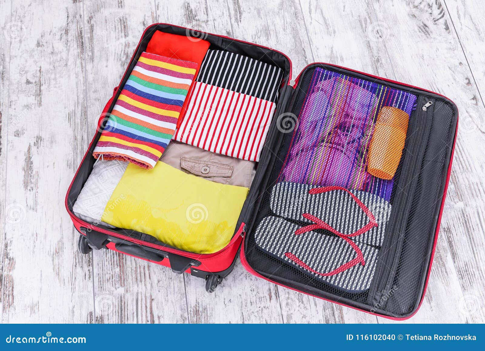 Suitcase with things. stock photo. Image of cream, packed - 116102040