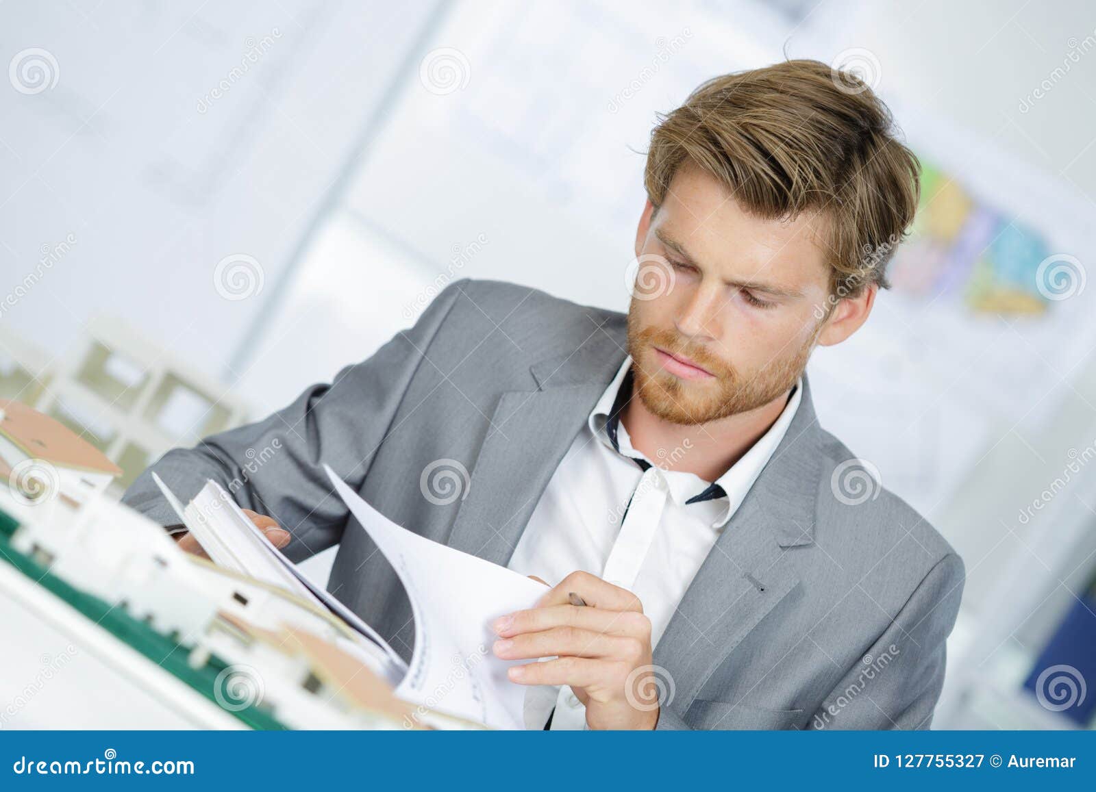 Suited Man Working on Model Development Stock Image - Image of business ...