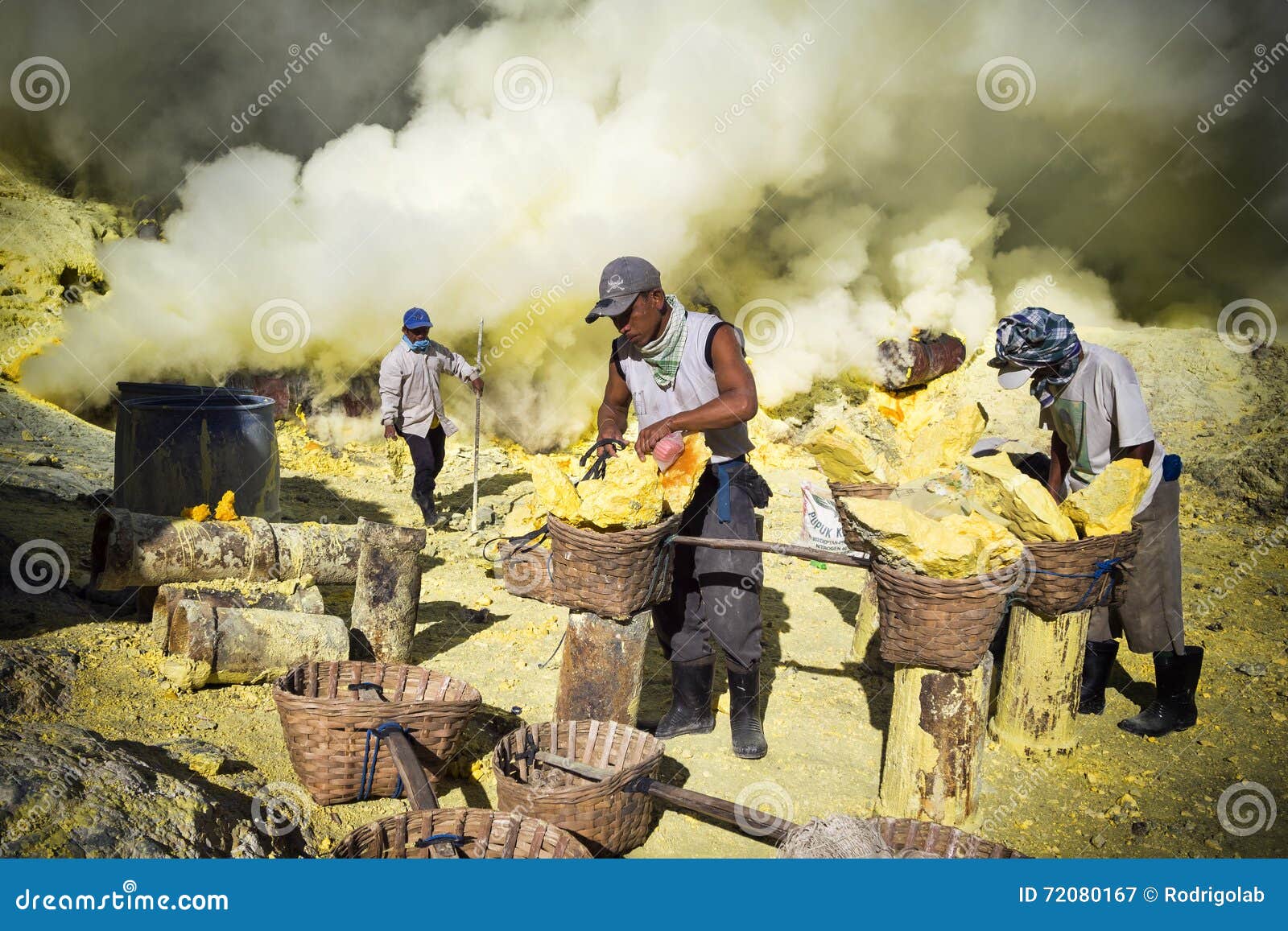 Sulfur Miners at Kawah Ijen Volcano in Java, Indonesia Editorial ...