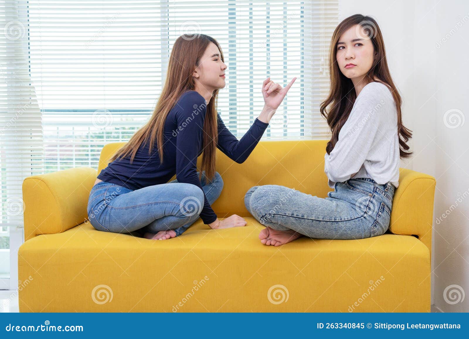 Sulk And Reconcile Asian Couple Woman Lover On The Yellow Sofa