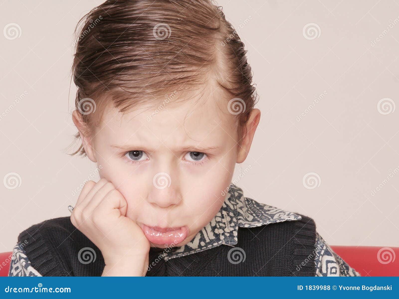Sullen young boy stock photo. Image of expression, displeased - 1839988