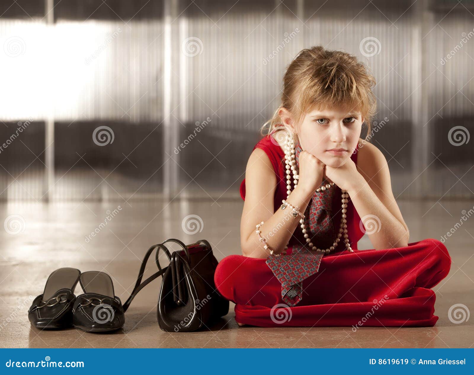 Sullen young girl in red stock image. Image of unhappy - 8619619