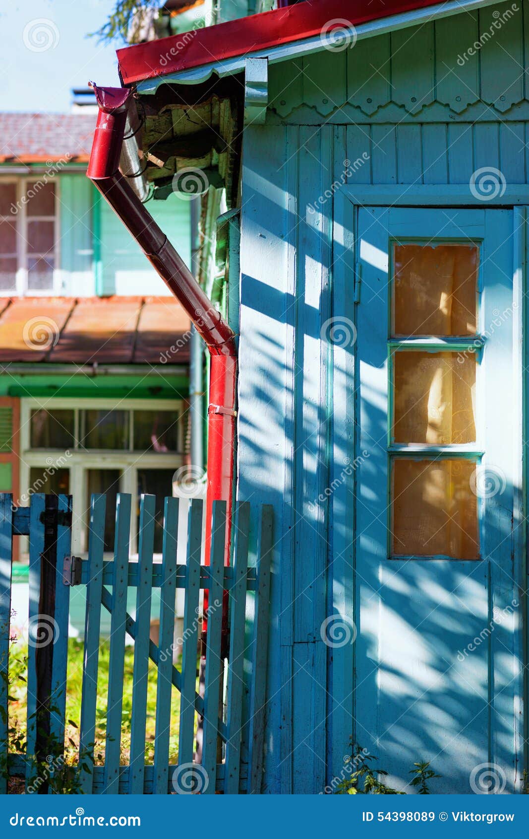 Summer Brightly Colored House with a Wicket Stock Image - Image of ...