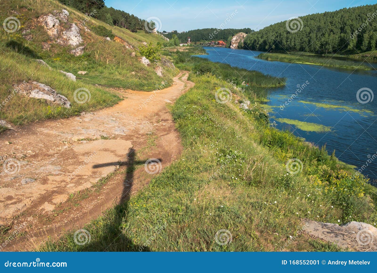 On a Summer Day, the Shadow of the Cross Falls on the Road and the ...