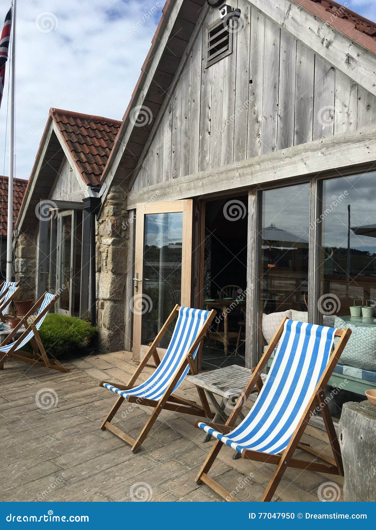 Summer deck chairs editorial image. Image of relaxation - 77047950