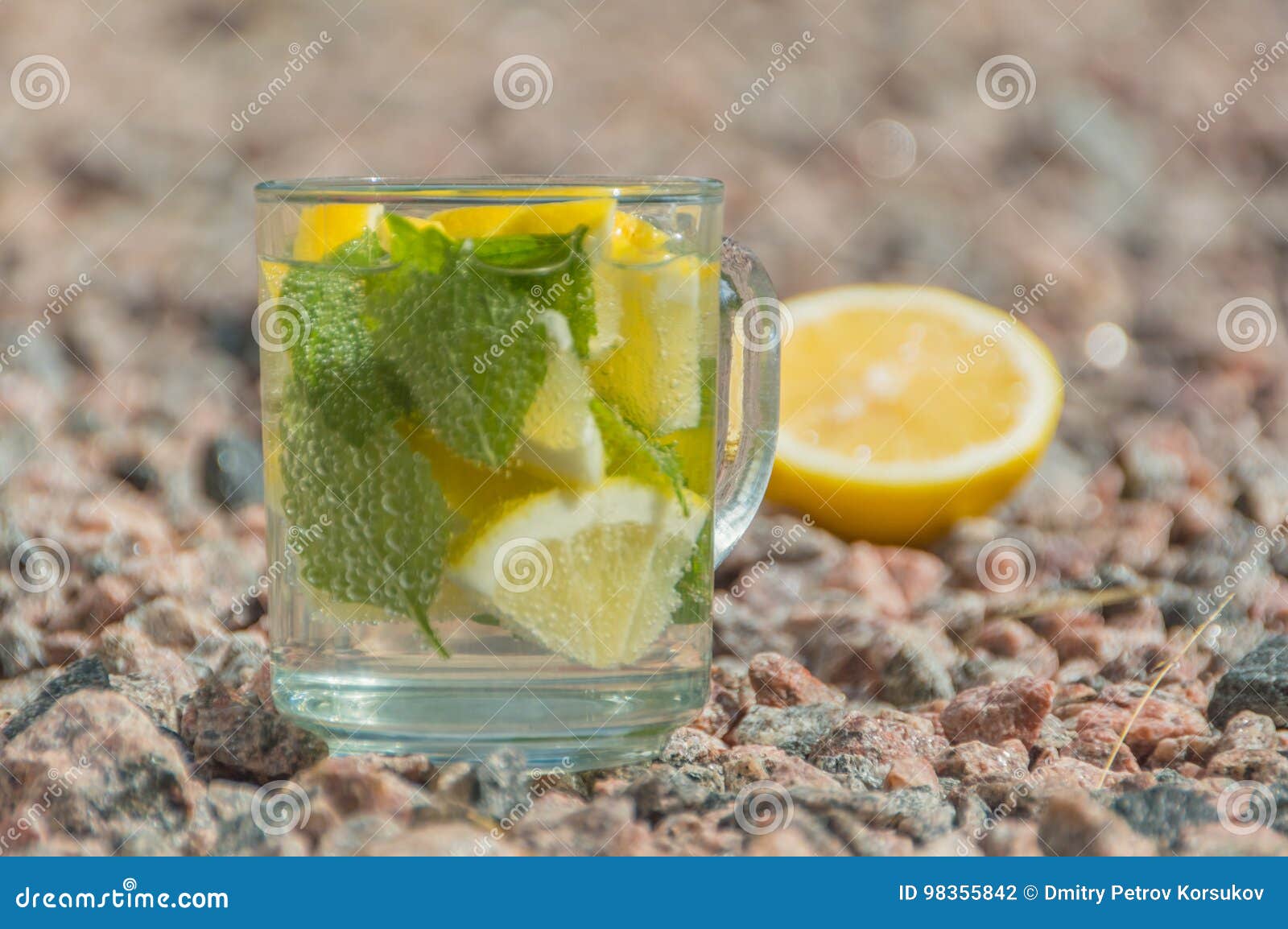 A Summer Drink of Lemon and Mint on the Rocks. Stock Photo - Image of ...