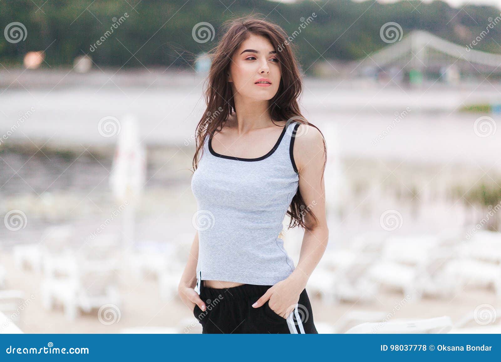 Summer Fashion Portrait Of Stunning Woman With Tanned Fit Body Wearing